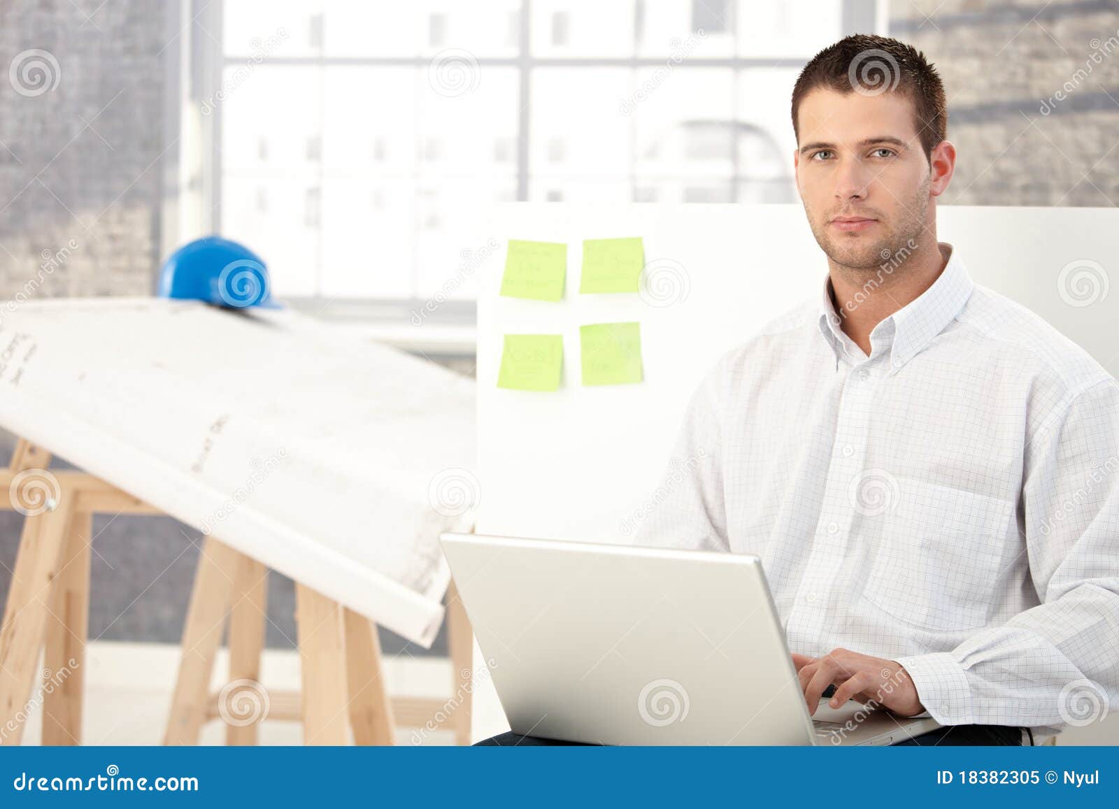 Young Man Working in Engineering Office Stock Image - Image of ...