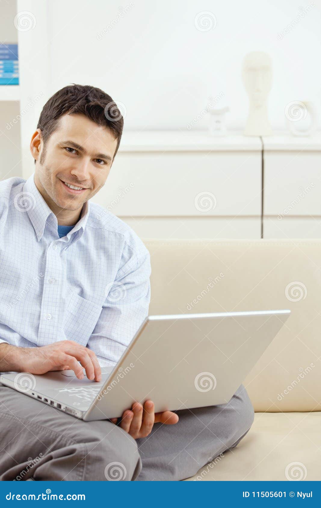 Young man working at home stock image. Image of expression - 11505601