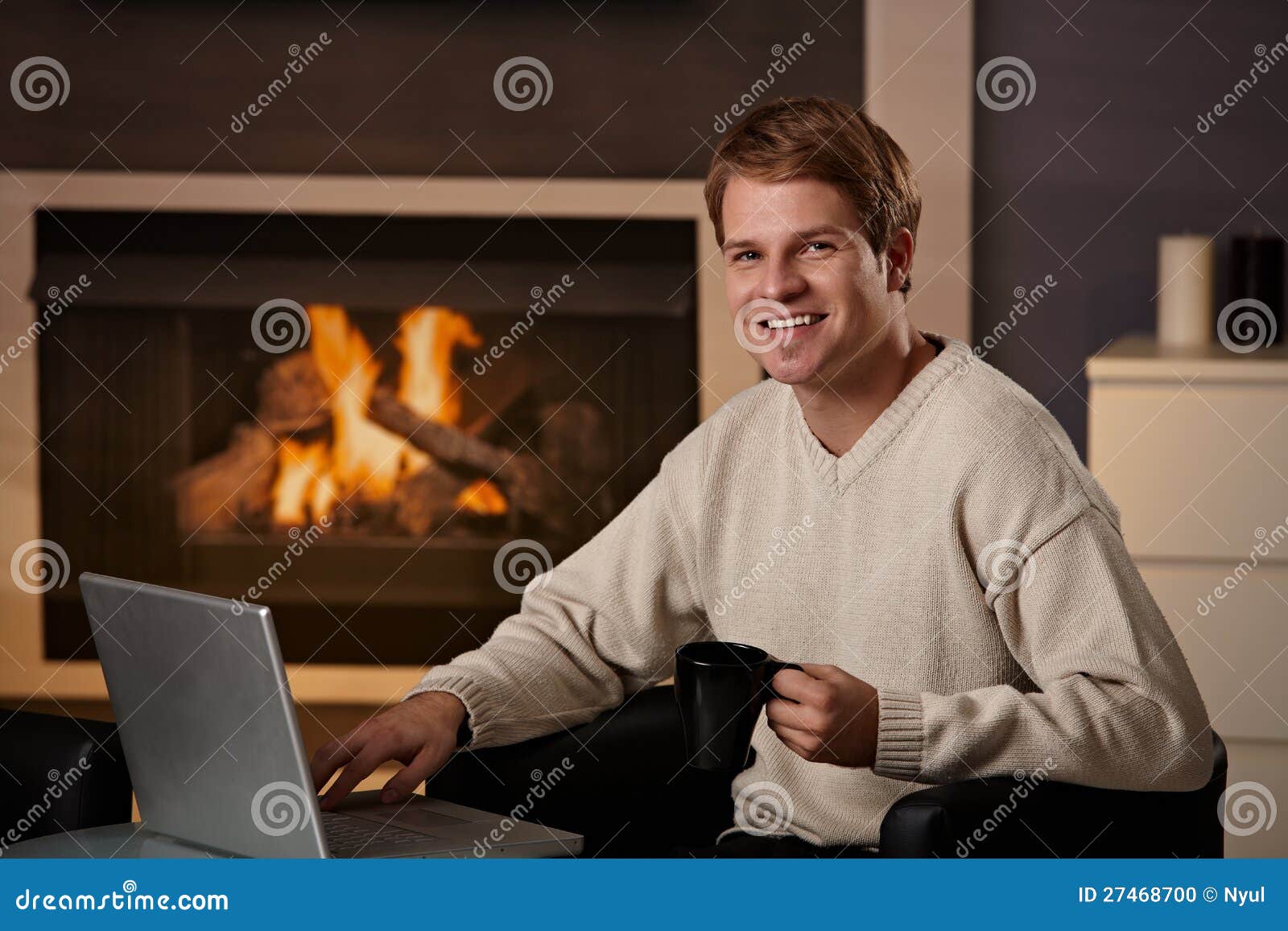 Young man working at home stock photo. Image of interior - 27468700