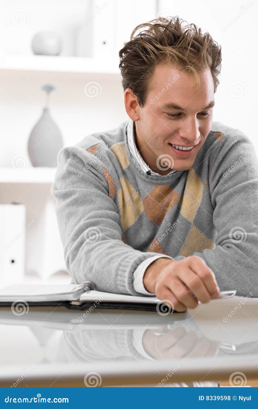 Young man working at home stock photo. Image of office - 8339598