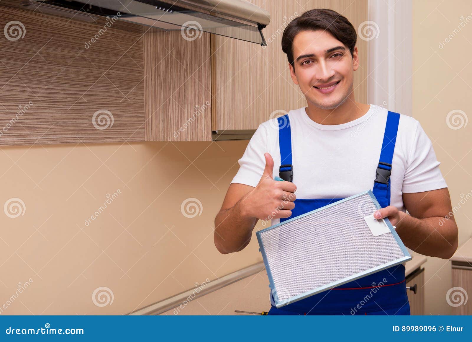 The Young Man Working with Kitchen Equipment Stock Photo - Image of ...
