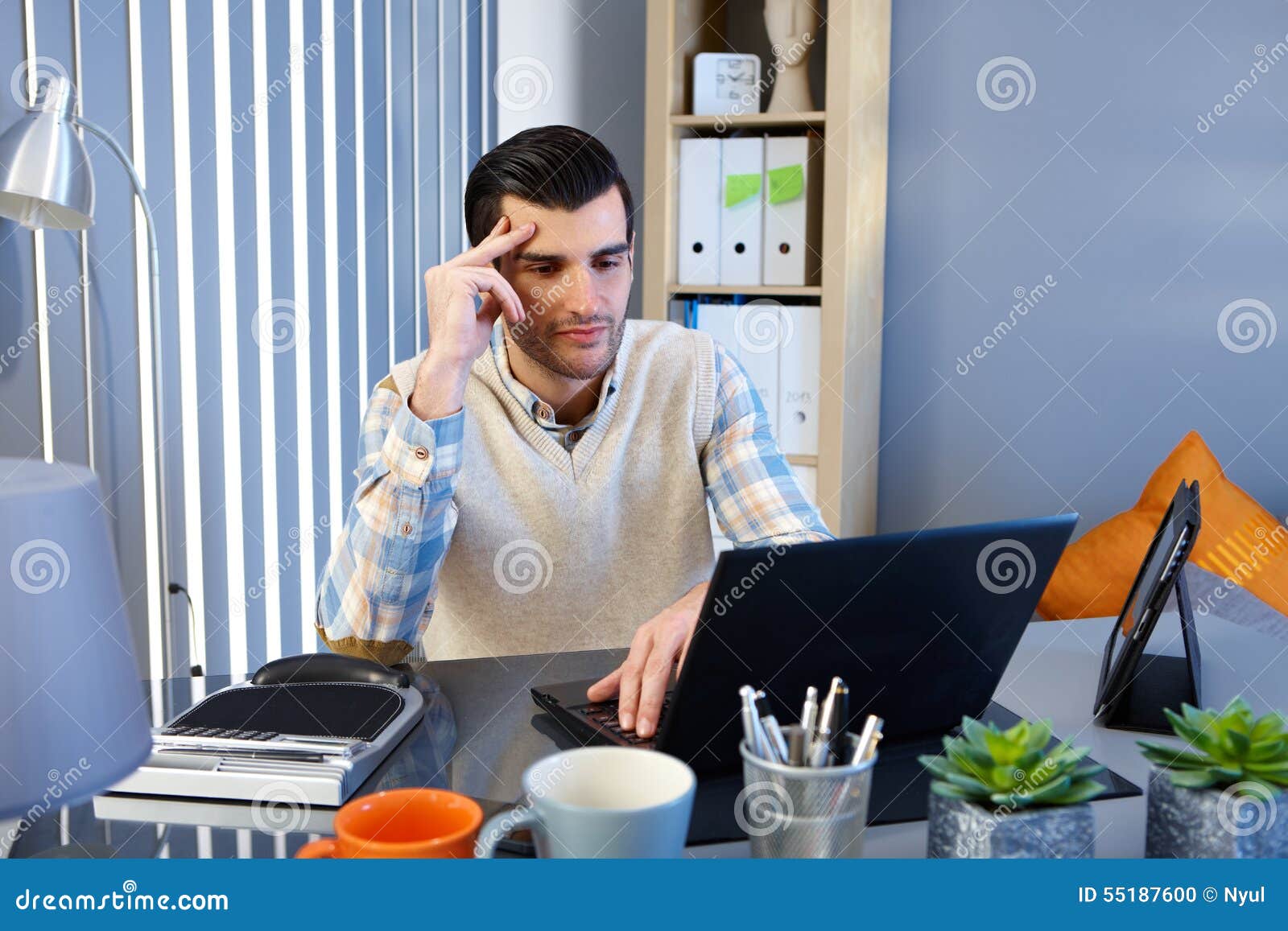 Young Man Working with Laptop Computer Stock Photo - Image of focusing ...