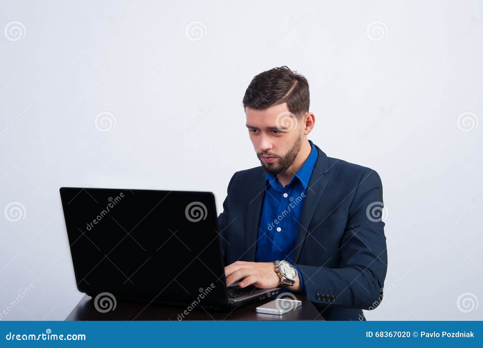 Young Man Working at a Laptop Stock Photo - Image of keyboard, laptop ...