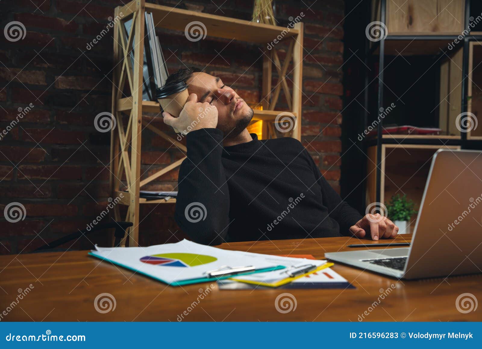 Young Man Working in Modern Office Using Devices and Gadgets. Making ...