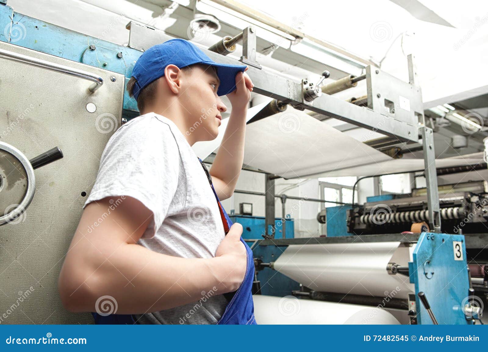 Young Man Working in Newspaper Factory Stock Image - Image of cleaning ...