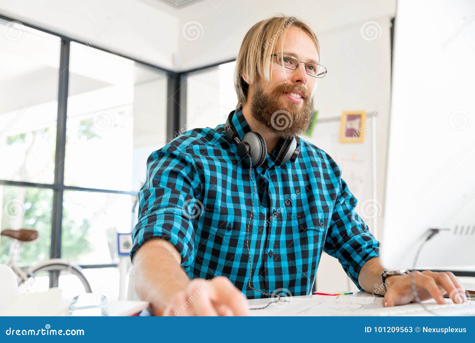 Young Man Working in Office Stock Image - Image of people, break: 101209563