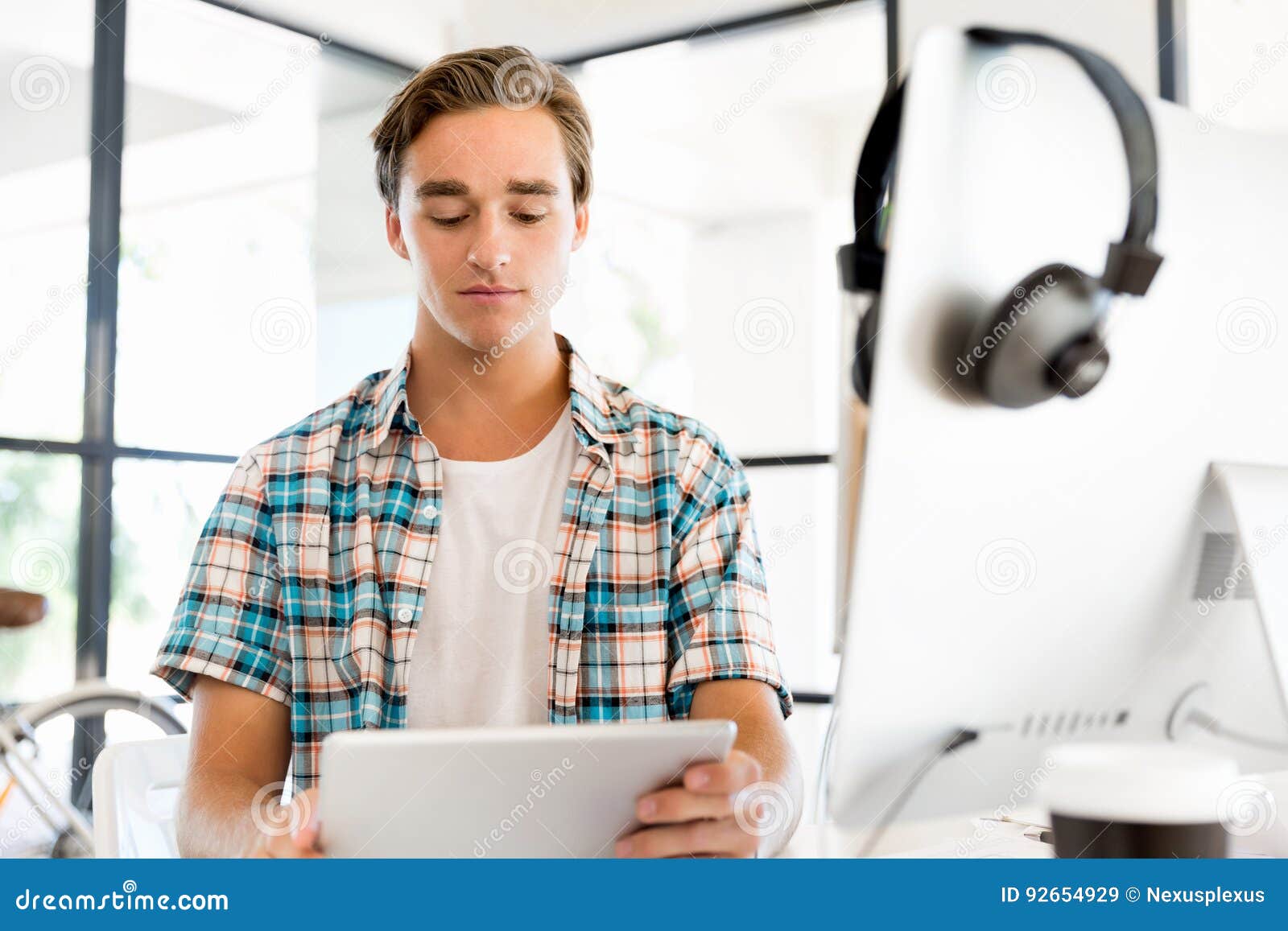 Young Man Working in Office Stock Image - Image of lifestyle, break ...