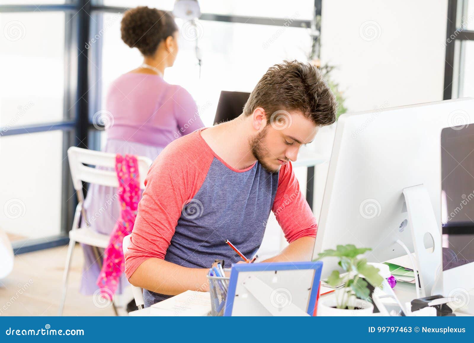 Young Man Working in Office Stock Image - Image of businessman ...