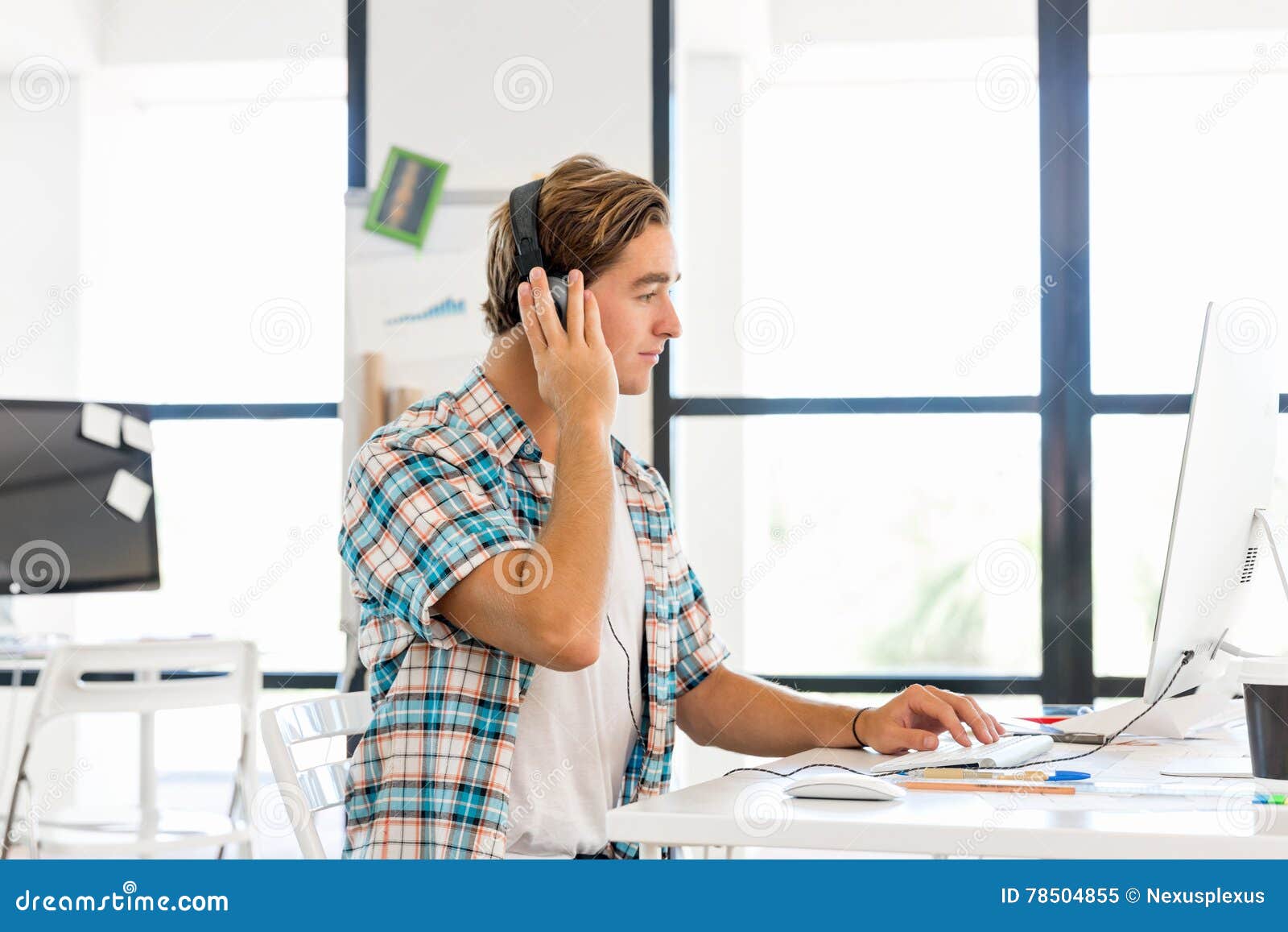 Young Man Working in Office Stock Image - Image of modern, break: 78504855