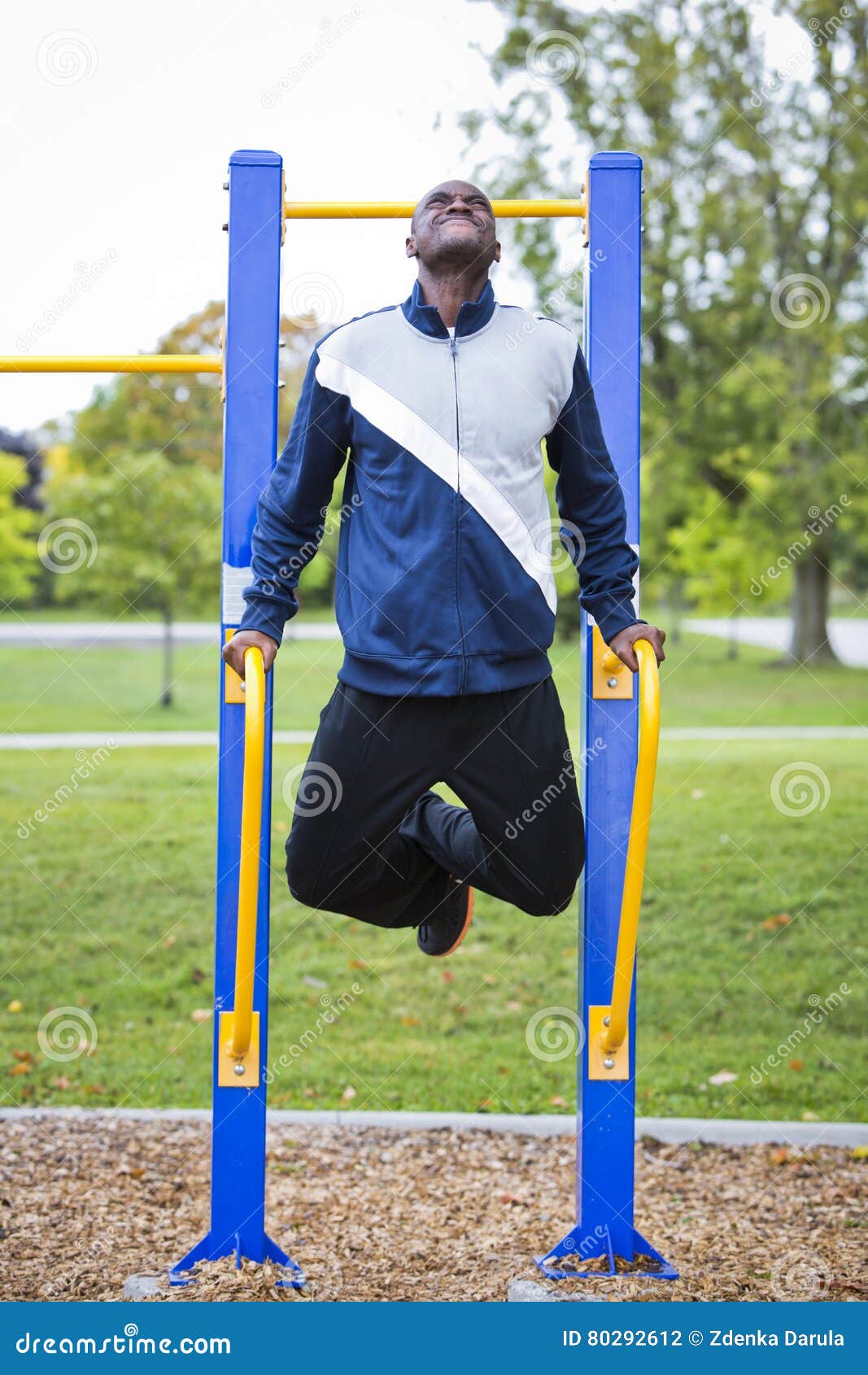 Young Man Working Out at Outdoor Gym Stock Photo - Image of active ...