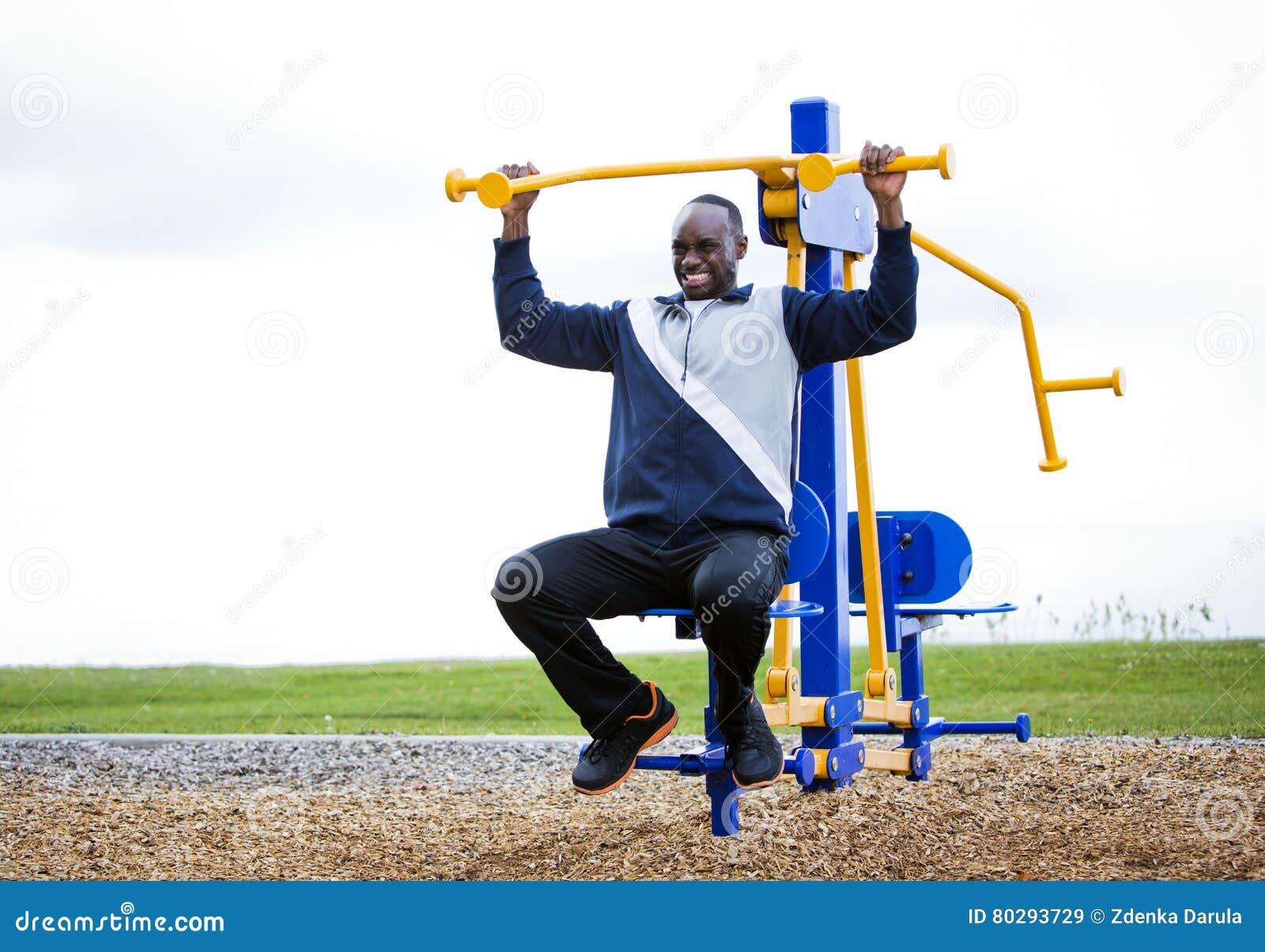 Young Man Working Out at Outdoor Gym Stock Image - Image of living ...