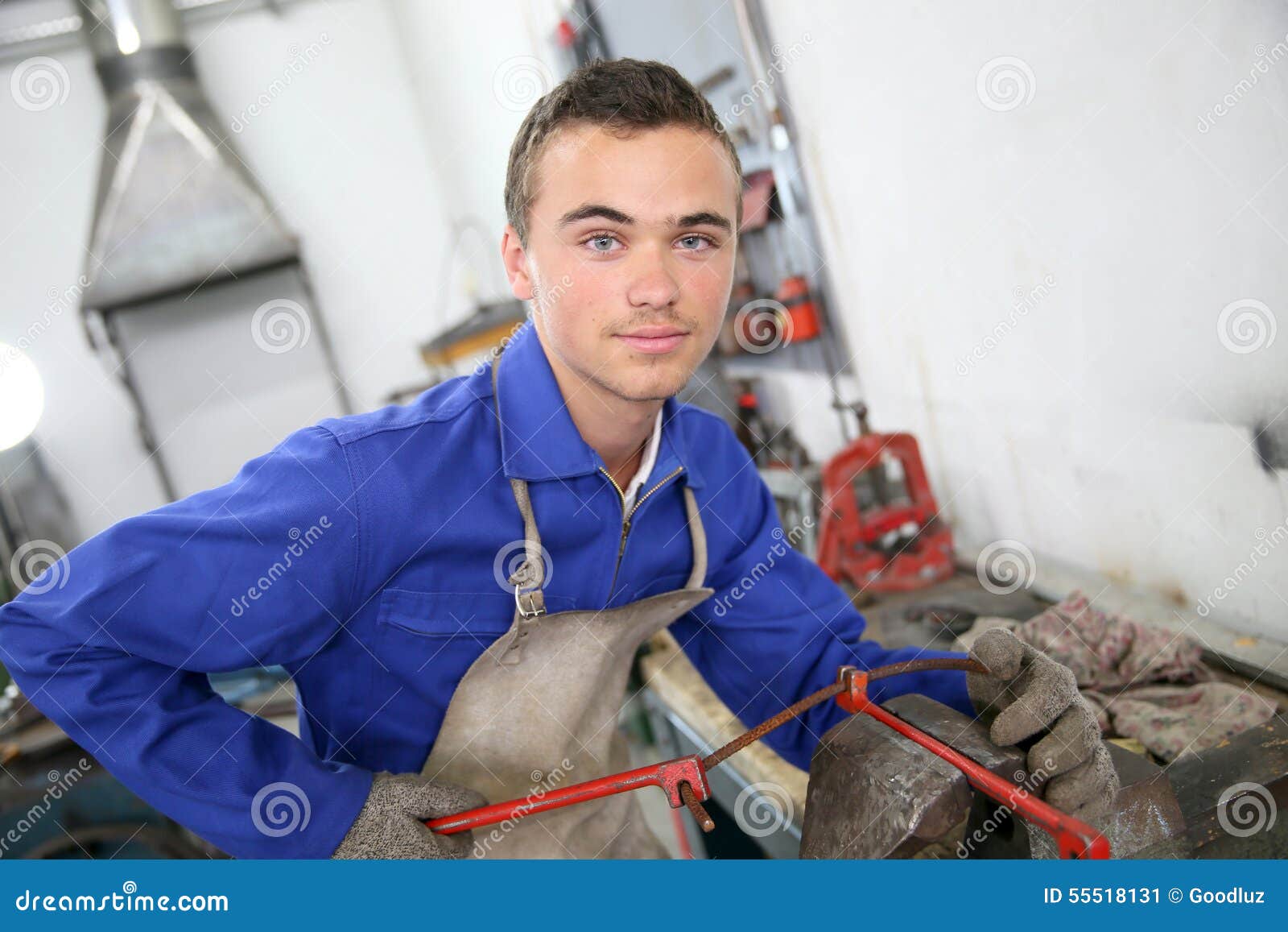 Young man working on steel stock image. Image of teenager - 55518131