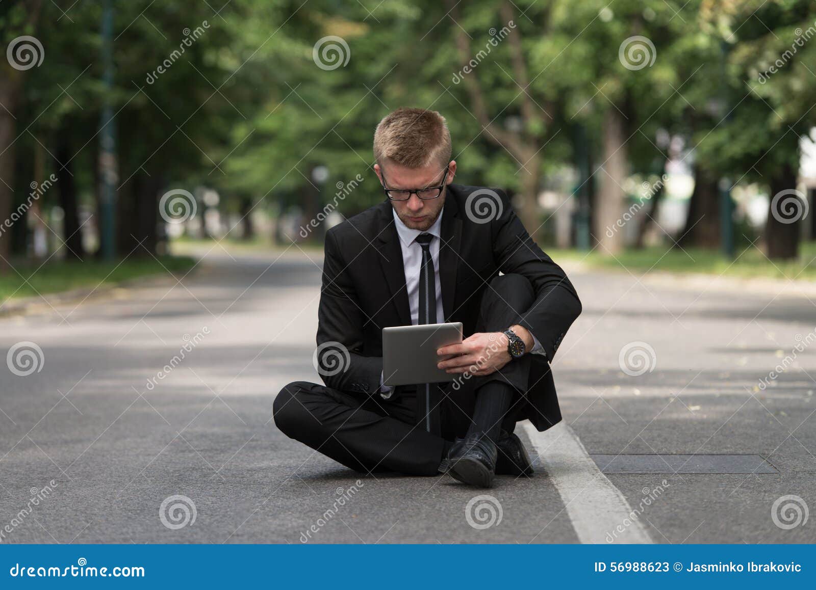 Young Man Working on Tablet Outside the Office Stock Image - Image of ...