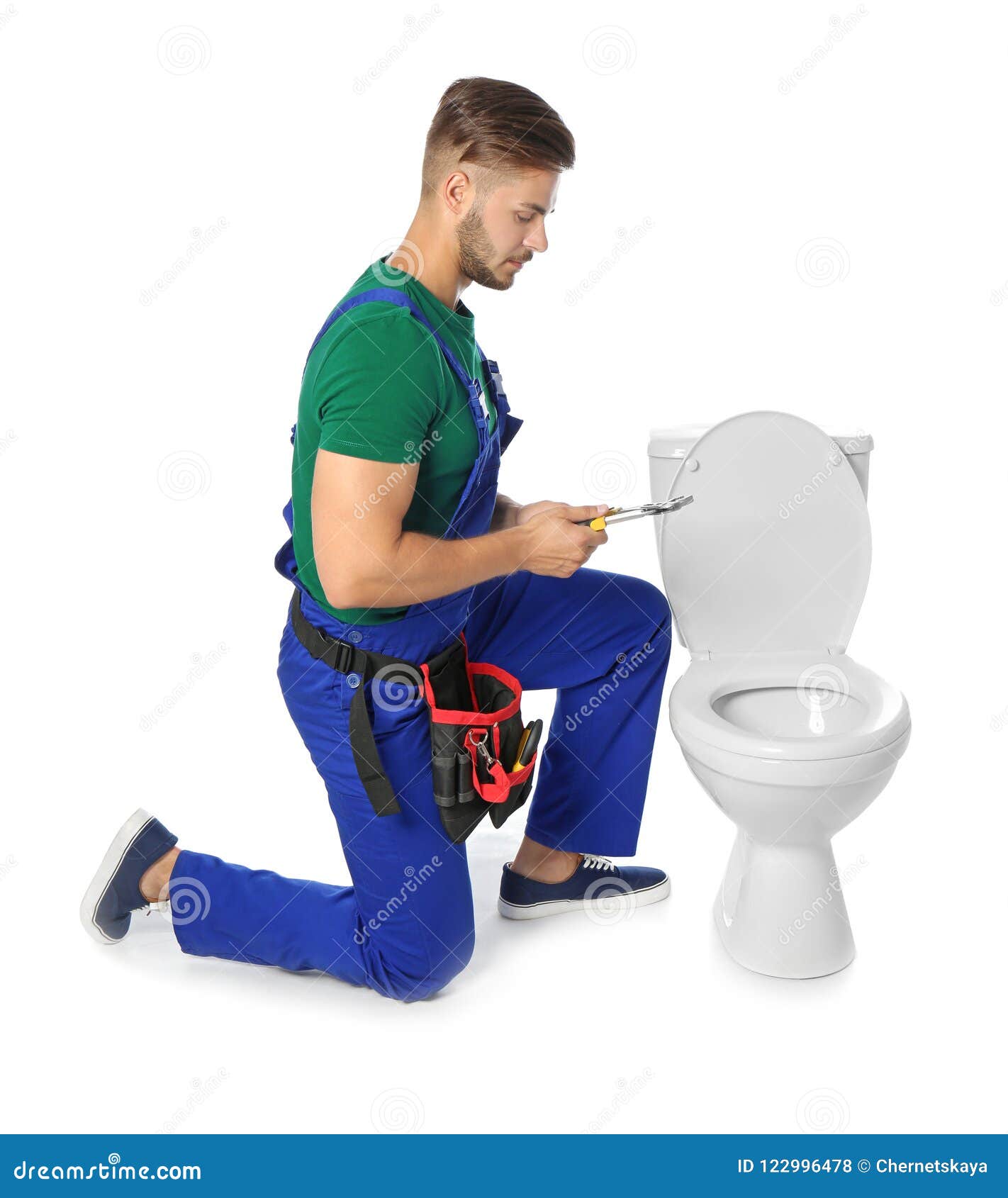 Young Man Working with Toilet Bowl Stock Photo - Image of background ...