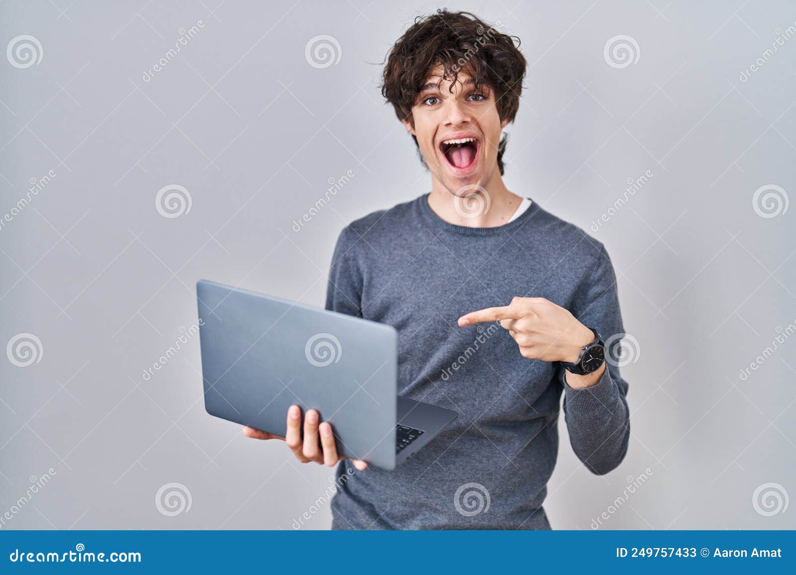 Young Man Working Using Computer Laptop Smiling Happy Pointing with ...