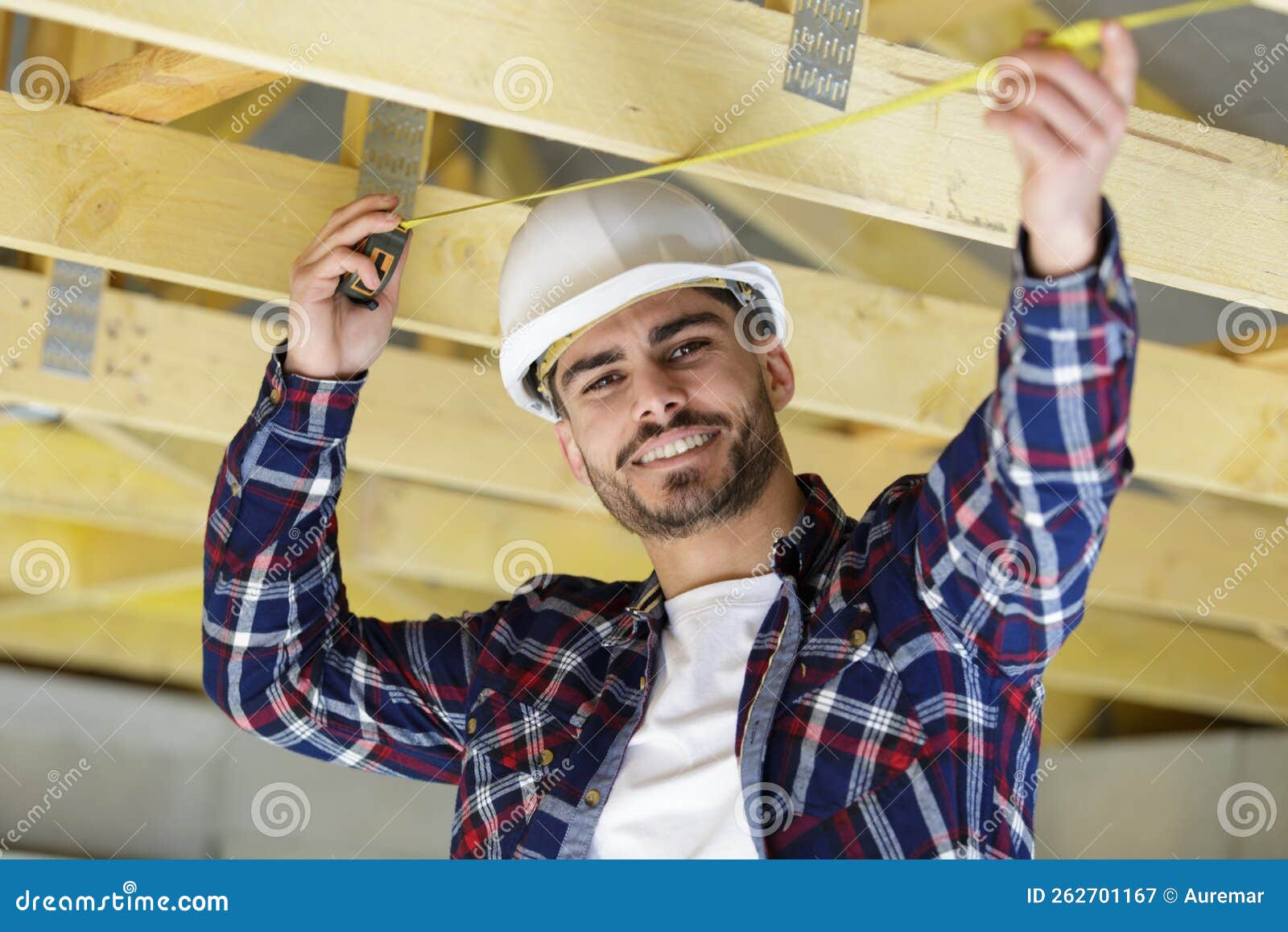 Young Man Working on Wood Structure Measuring with Ruler Stock Image ...