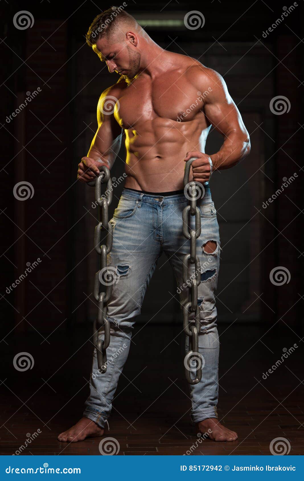 Young Man Workout Biceps with Chains Stock Photo - Image of building ...