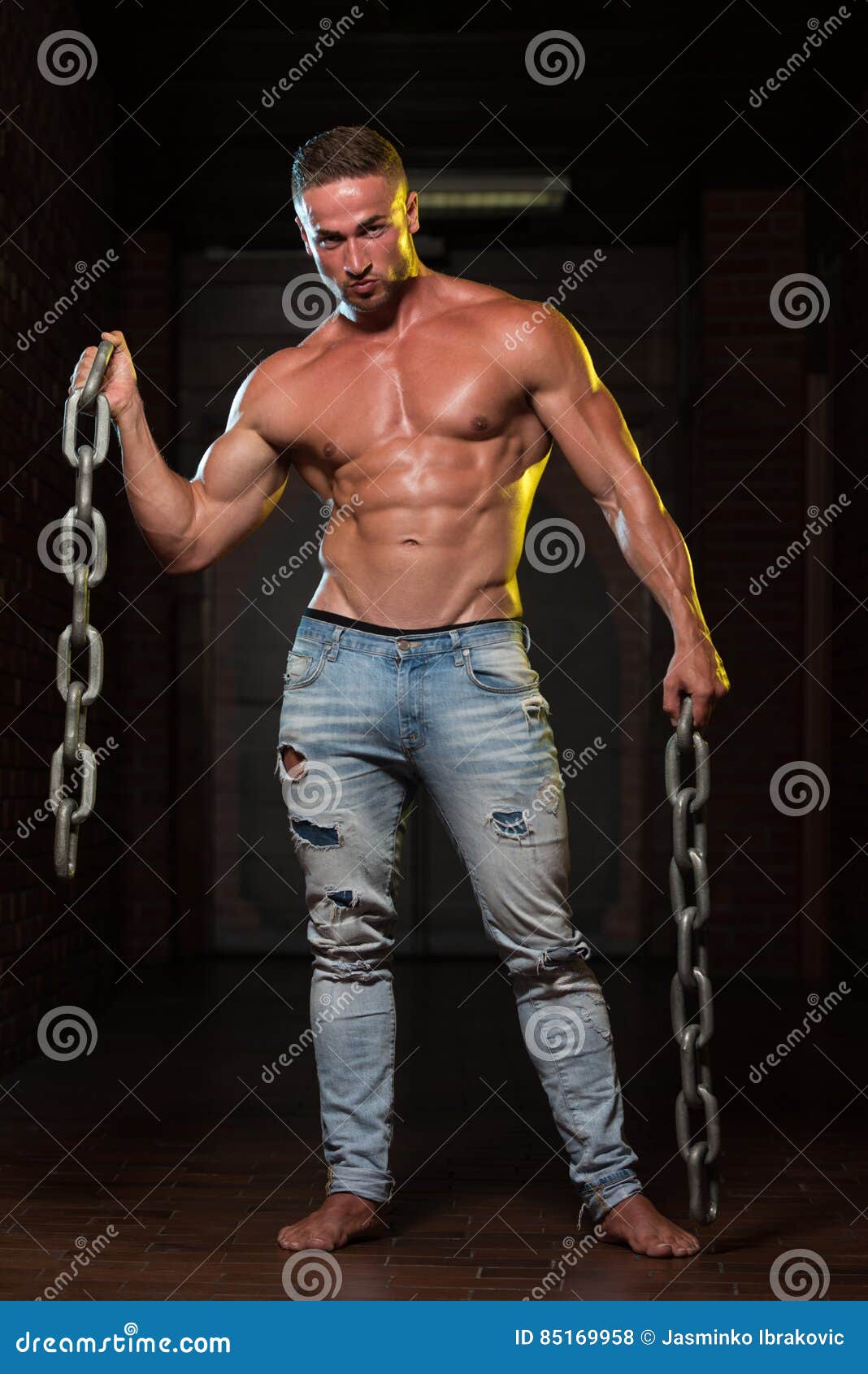 Young Man Workout Biceps with Chains Stock Photo - Image of muscles ...