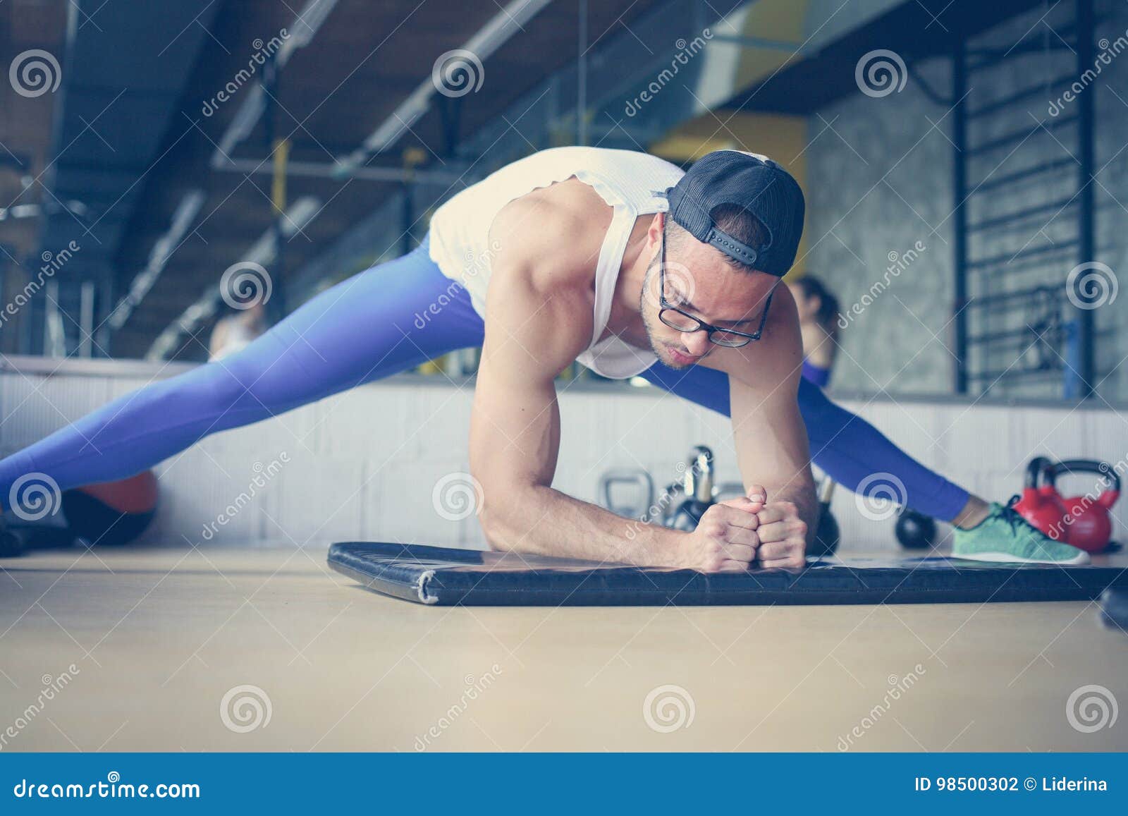 Young Man Workout in Healthy Club. Stock Photo - Image of adult, copy ...