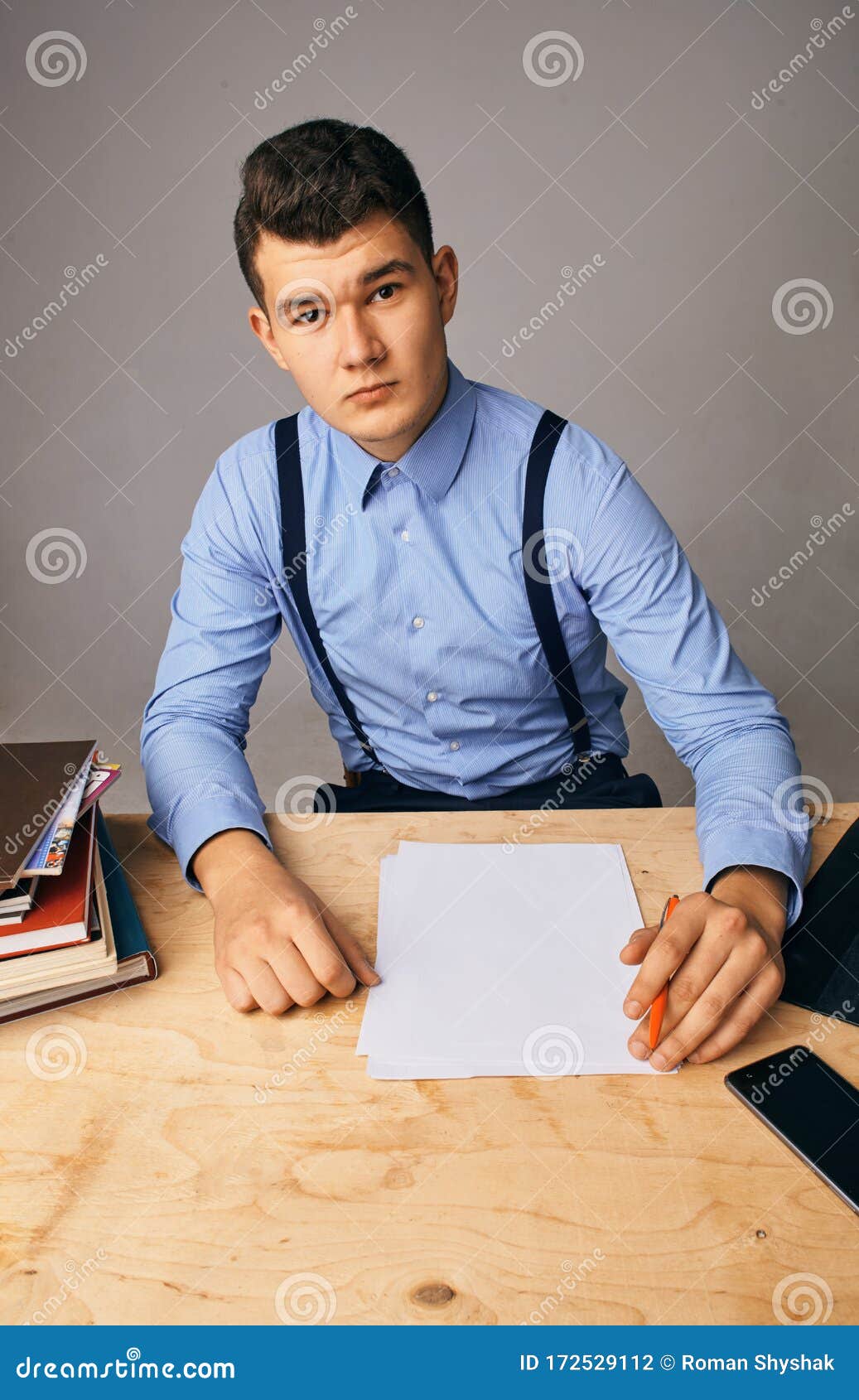 Young Man in the Workplace Thinking about Something Stock Photo - Image ...