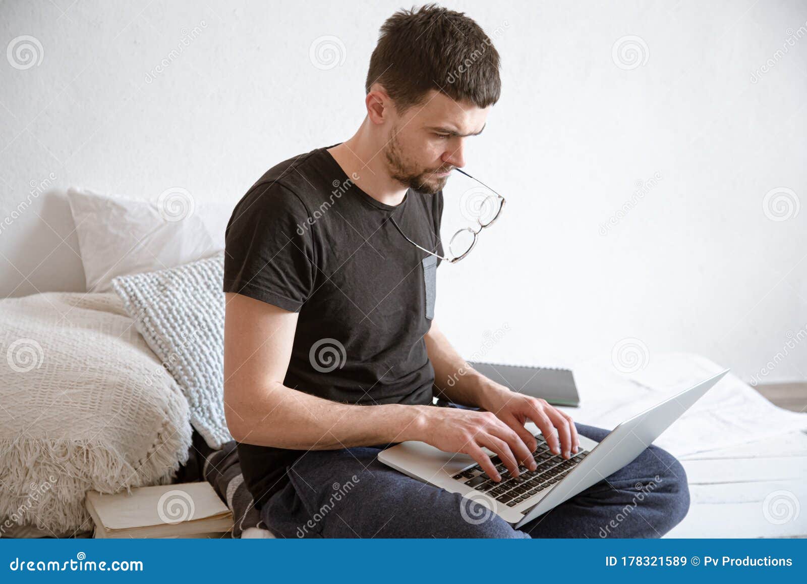 A Young Man Works Remotely at a Computer at Home Stock Image - Image of ...