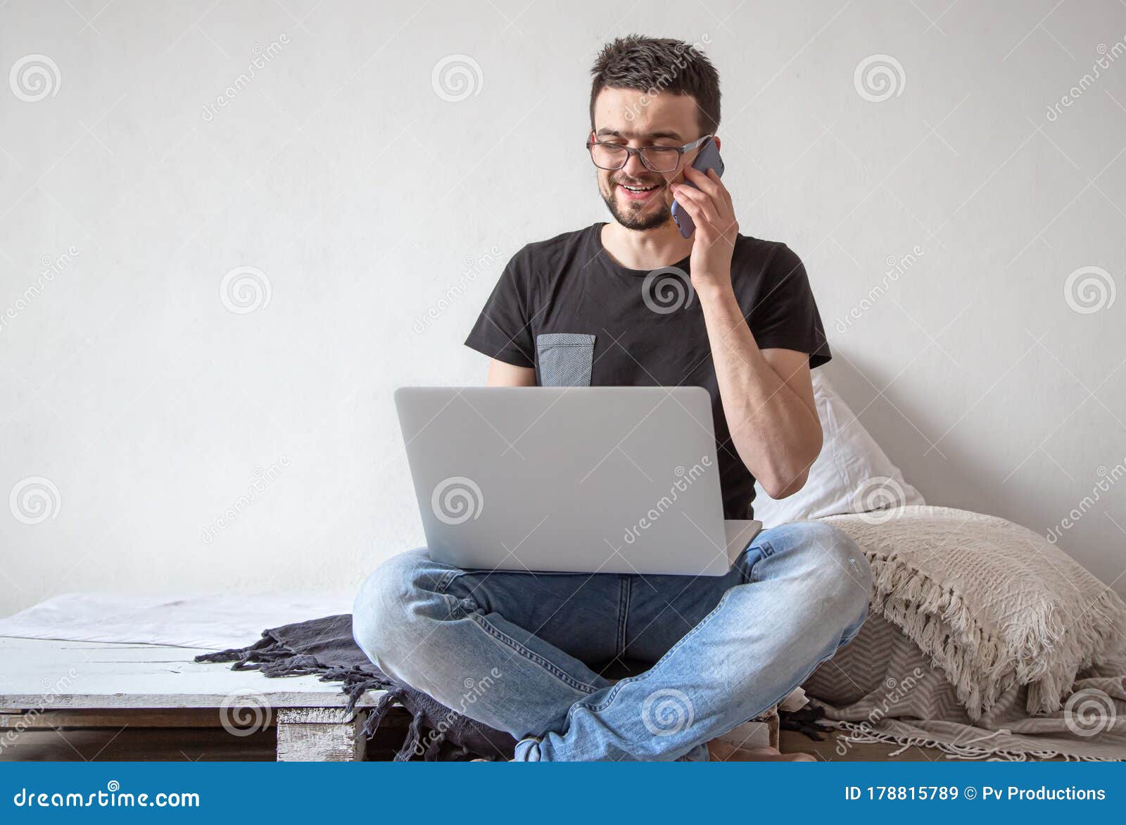A Young Man Works Remotely at a Computer at Home Stock Image - Image of ...