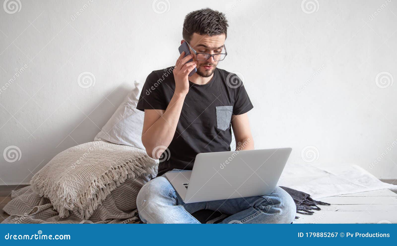 A Young Man Works Remotely at a Computer at Home Stock Image - Image of ...