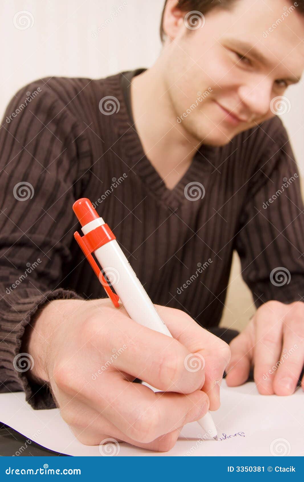 Young man writing stock image. Image of person, successful - 3350381
