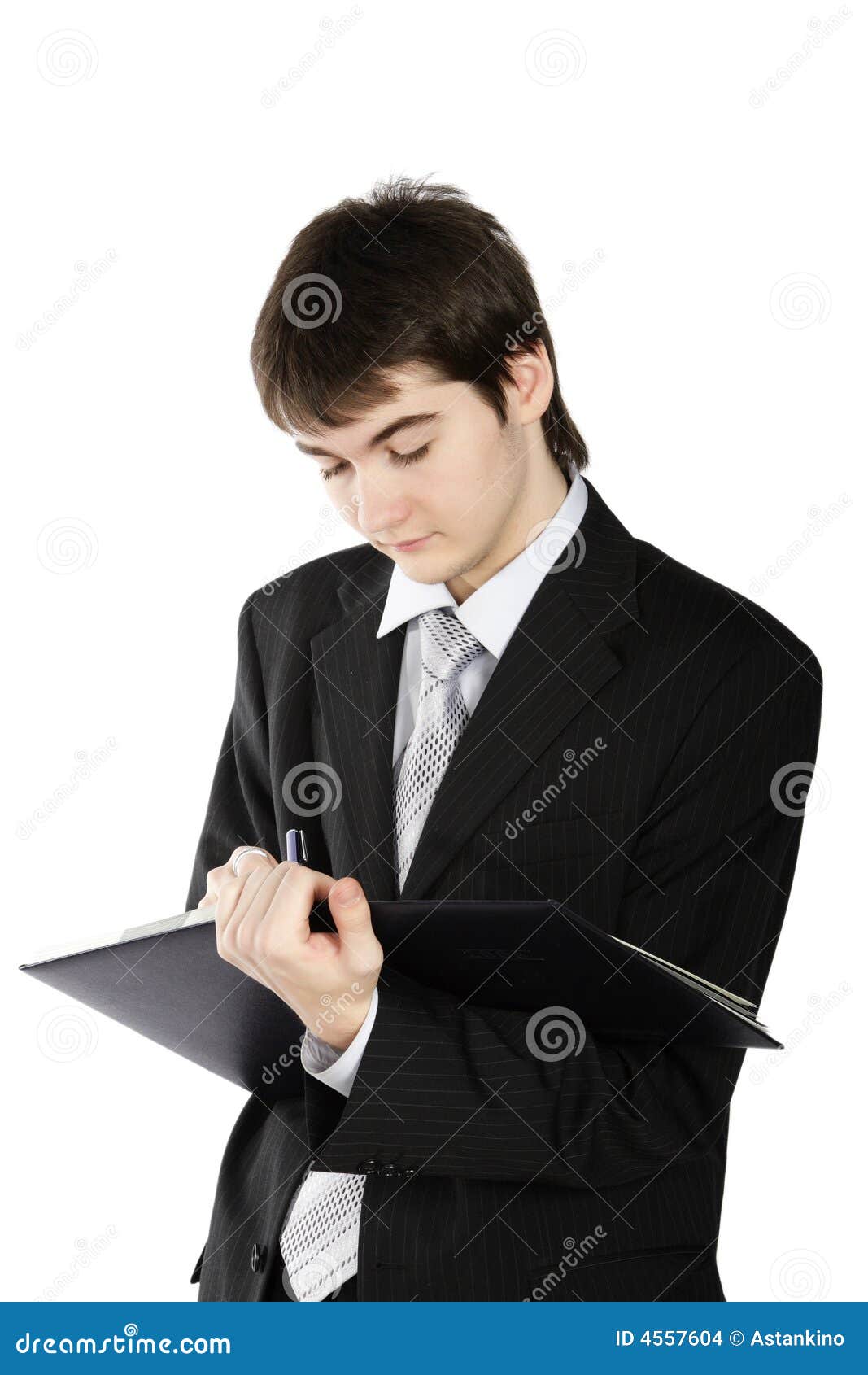 Young man writing stock photo. Image of homework, learning - 4557604