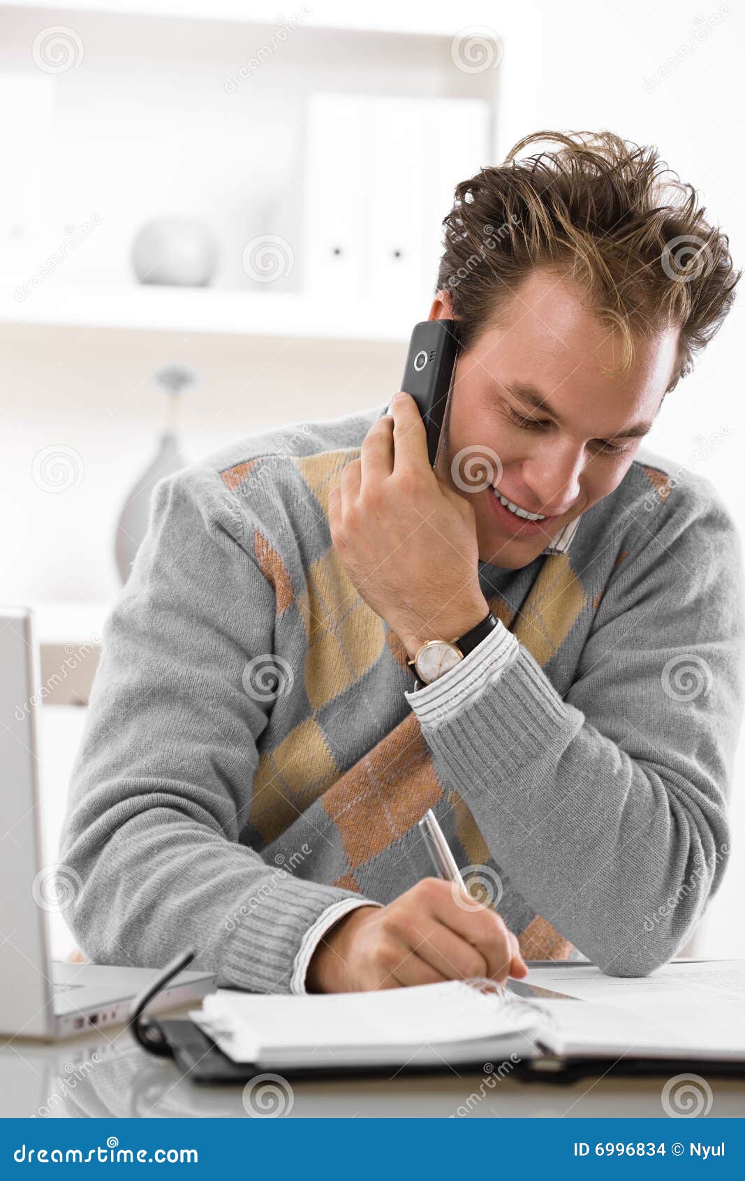 Young man writing stock photo. Image of interior, desk - 6996834