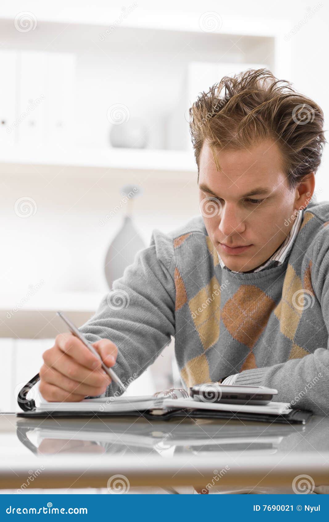 Young man writing stock image. Image of office, adult - 7690021