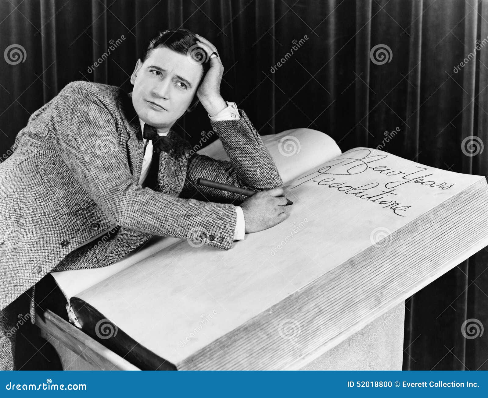 Young Man Writing into an Oversized Note Book Stock Photo - Image of ...