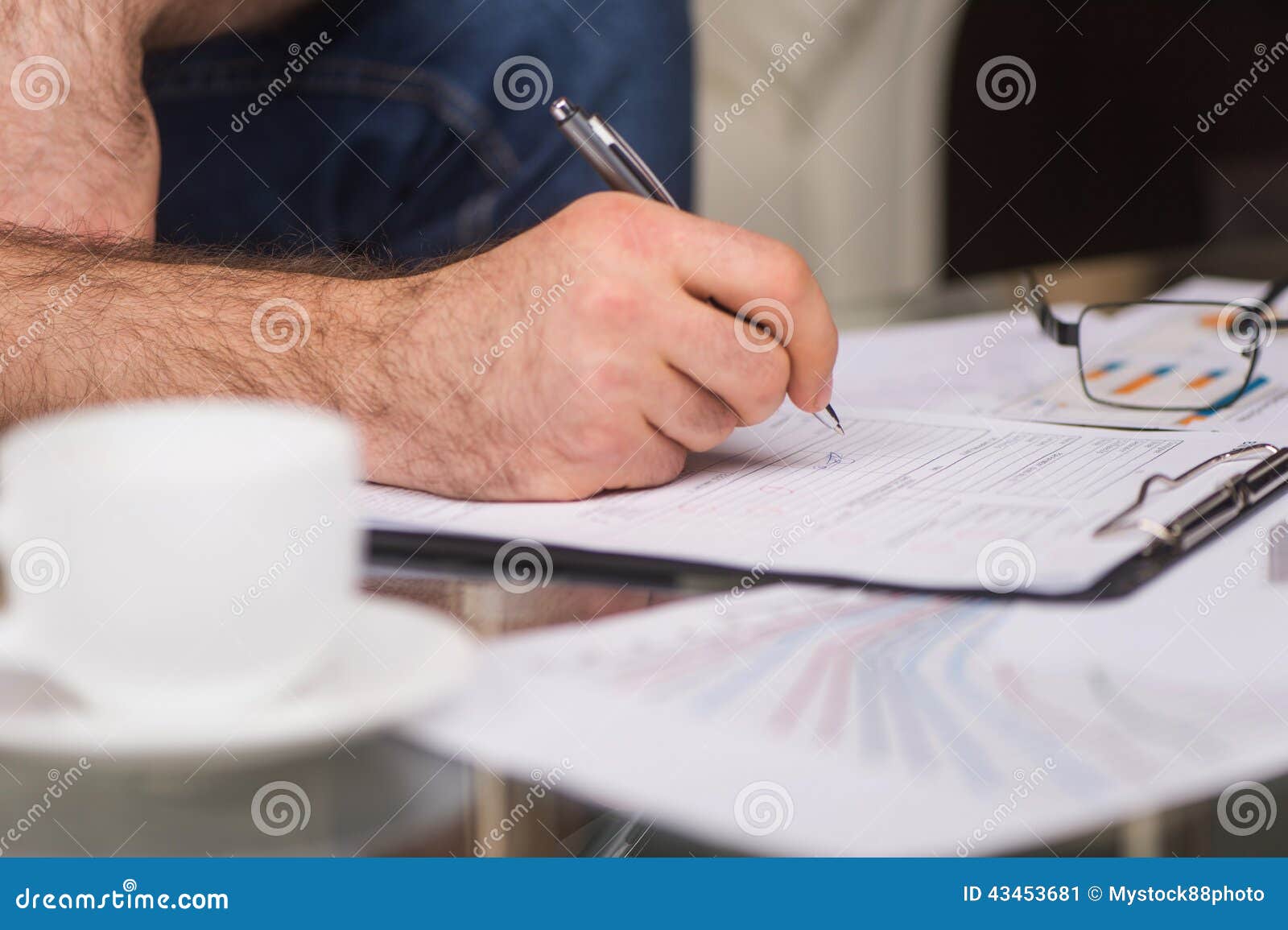 Young Man Writing on Paper while Sitting. Stock Image - Image of ...