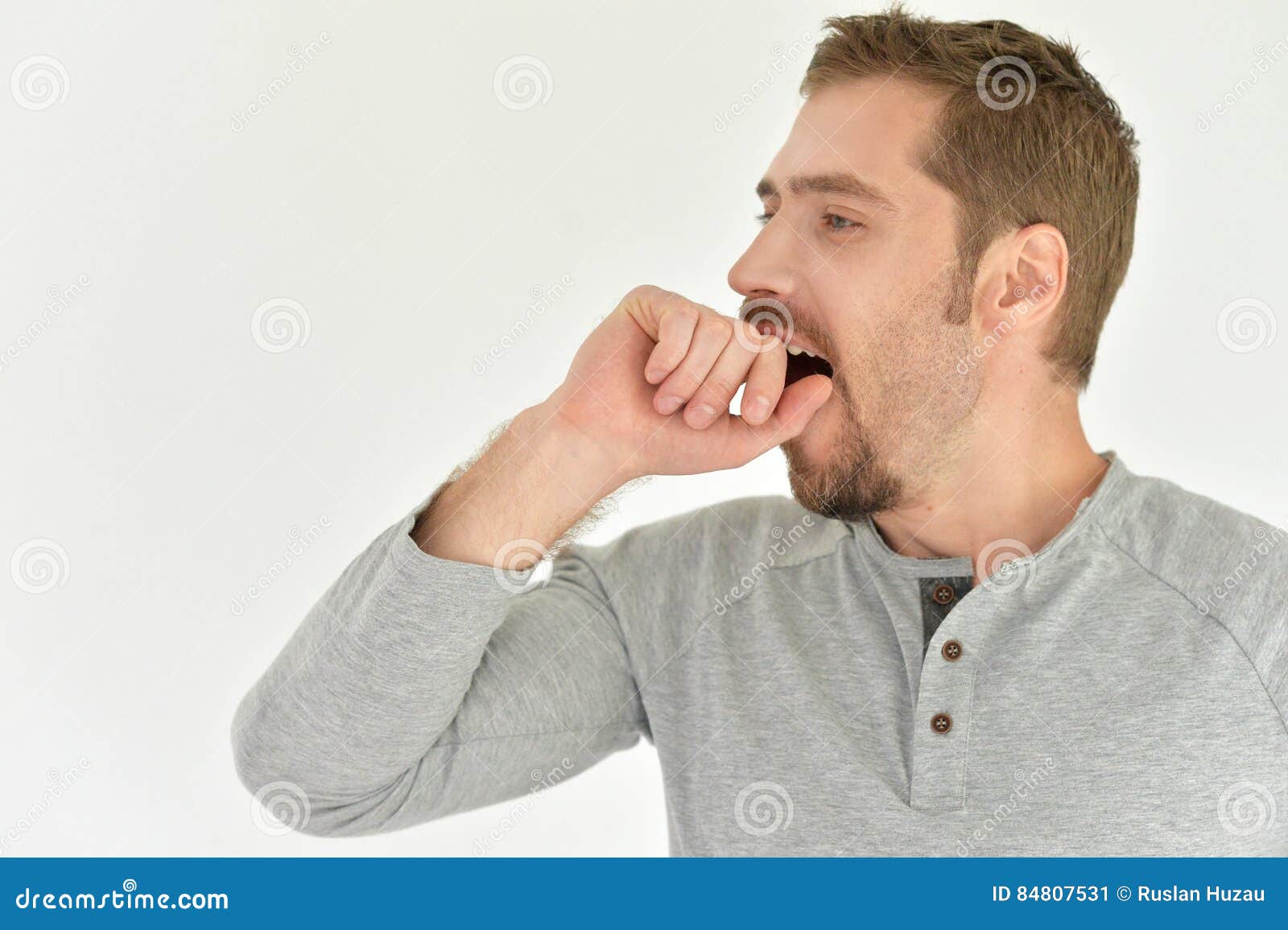 Young man yawing stock image. Image of manful, attractive - 84807531