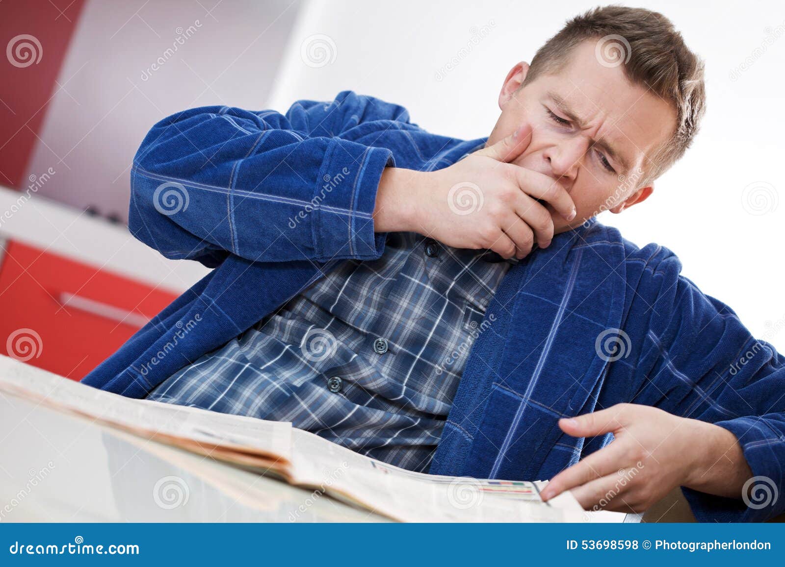 Young man yawning stock photo. Image of male, sitting - 53698598
