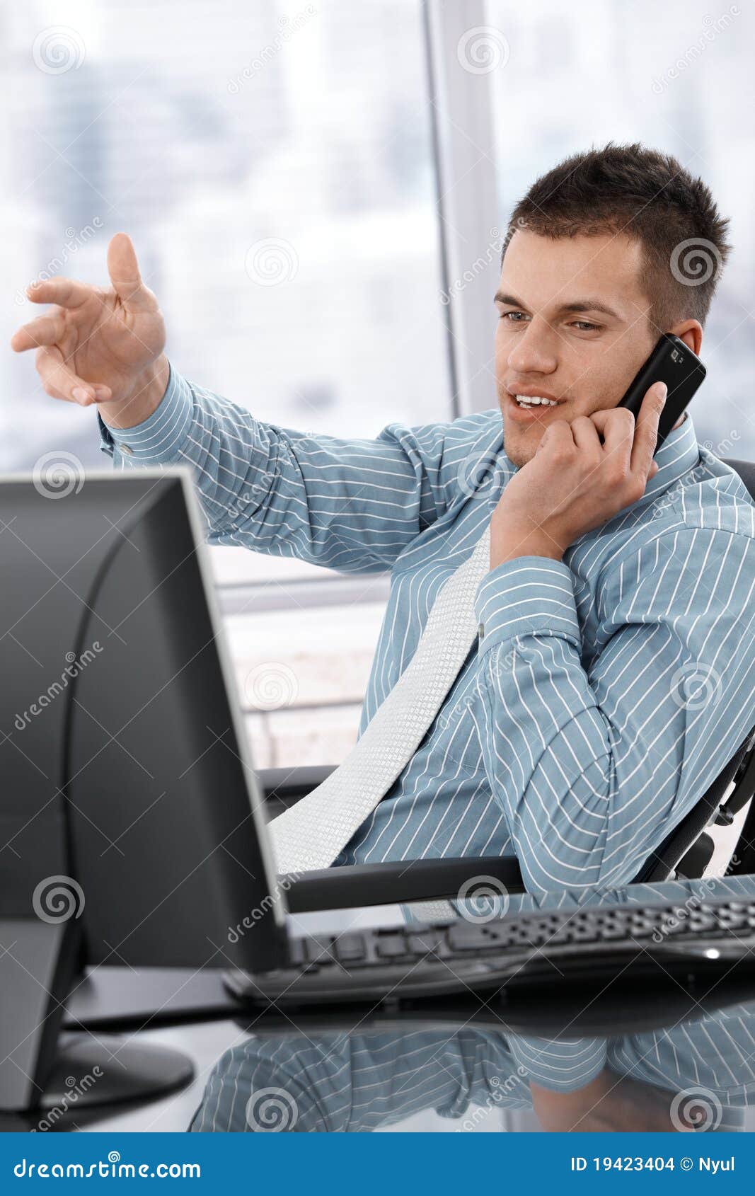 Young Manager on Mobile Phone Stock Photo - Image of handy, light: 19423404