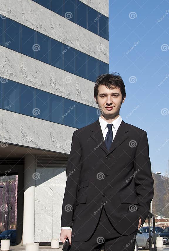 Young Manager and Skyscraper Stock Photo - Image of happy, pocket: 13747374