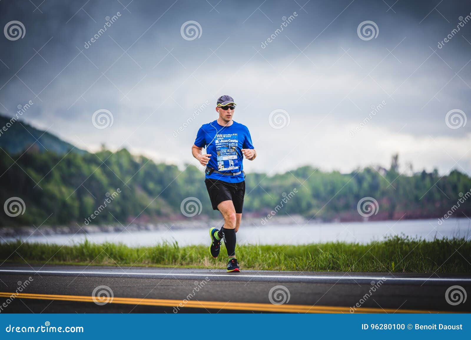 Young Marathoner Alone on the Side of the Road and Ocean Editorial ...