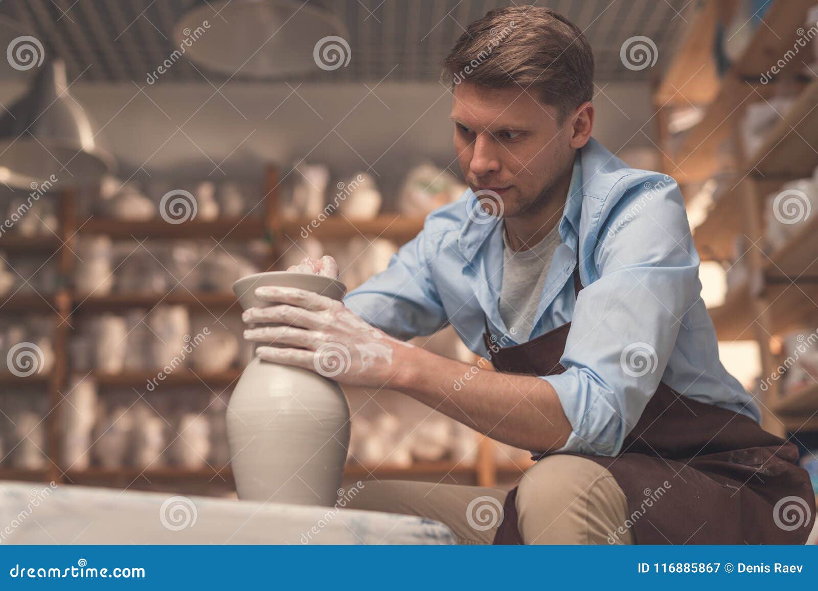 Young master at work stock image. Image of clay, young - 116885867