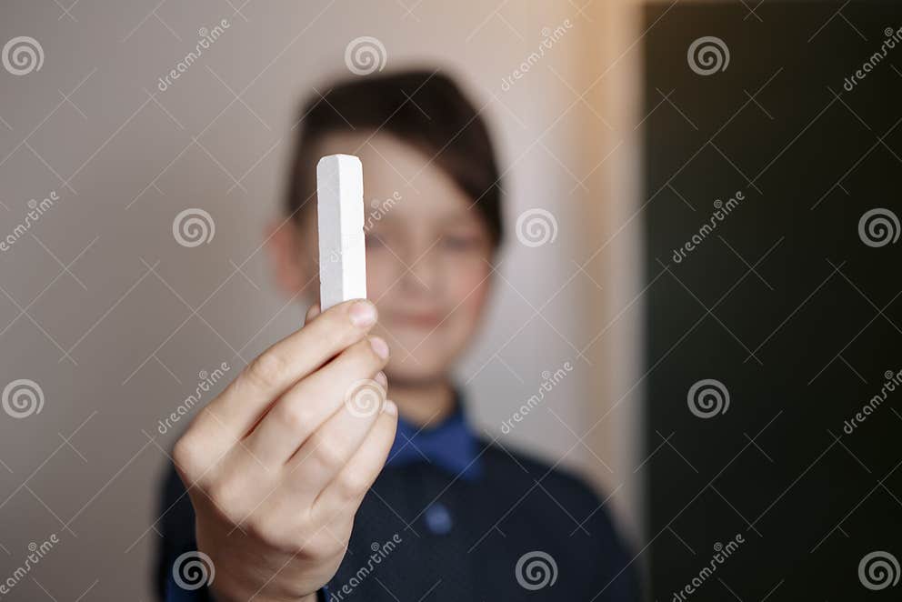 Young Math Genius in Front of Blackboard with Mathematical Problem and ...