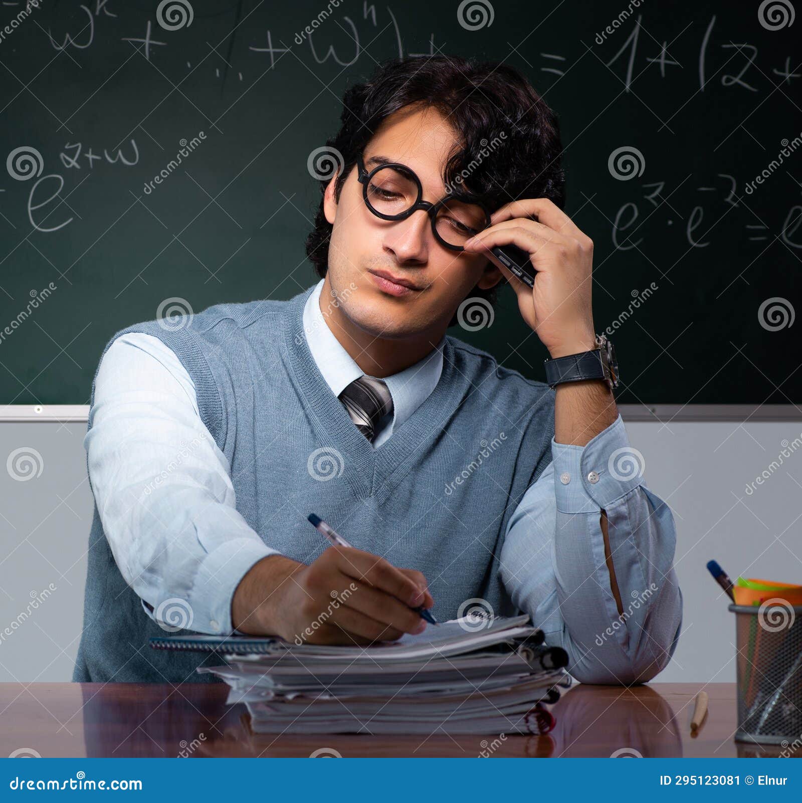 Young Math Teacher in Front of Chalkboard Stock Image - Image of ...