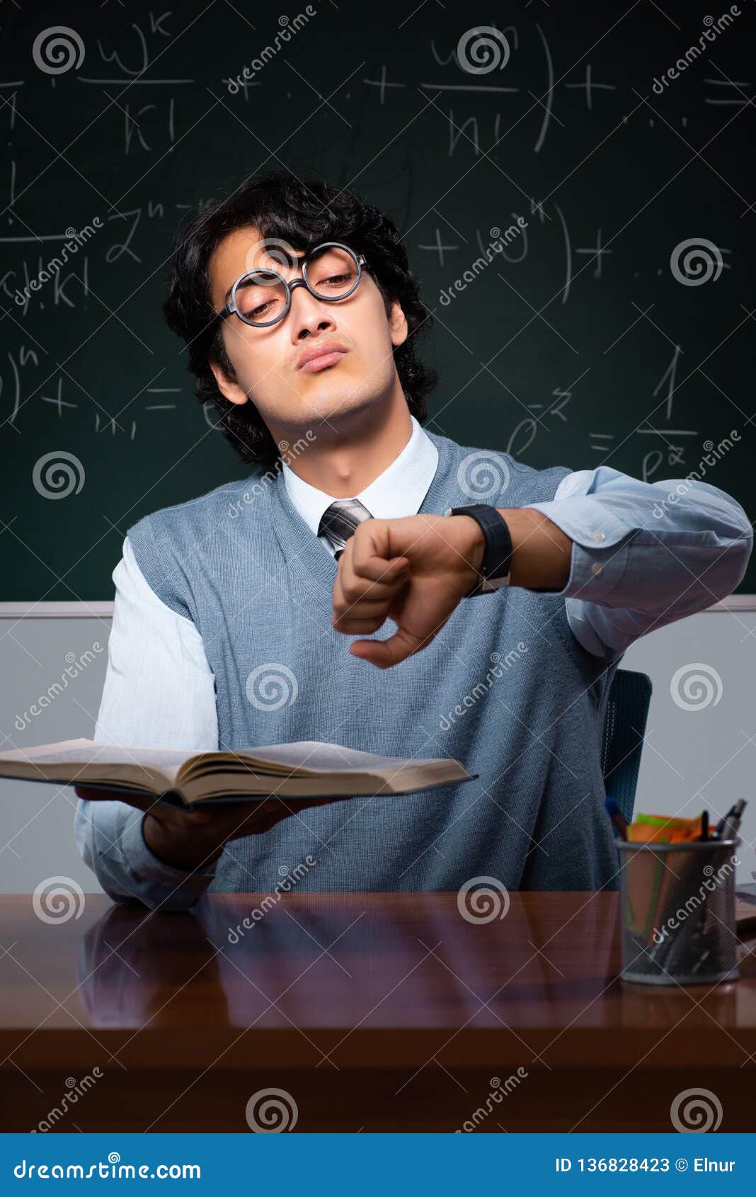 The Young Math Teacher in Front of Chalkboard Stock Image - Image of ...