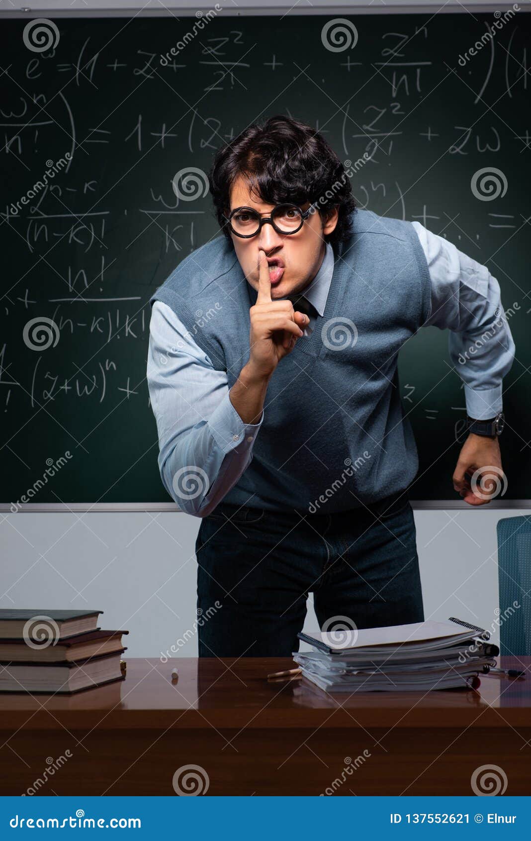 The Young Math Teacher in Front of Chalkboard Stock Image - Image of ...