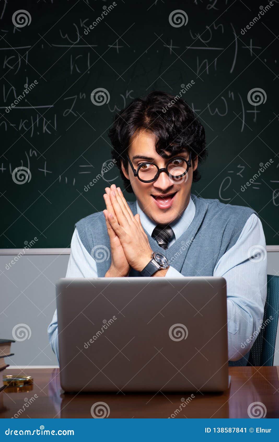 The Young Math Teacher in Front of Chalkboard Stock Image - Image of ...