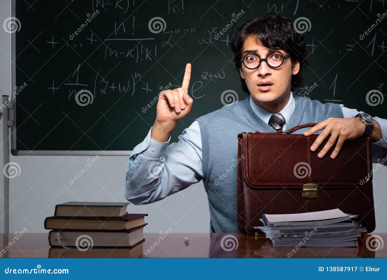 The Young Math Teacher in Front of Chalkboard Stock Image - Image of ... The Young Math Teacher in Front of Chalkboard Stock Image - Image of ...