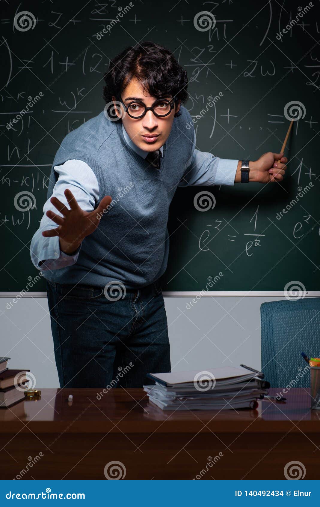 The Young Math Teacher in Front of Chalkboard Stock Photo - Image of ...