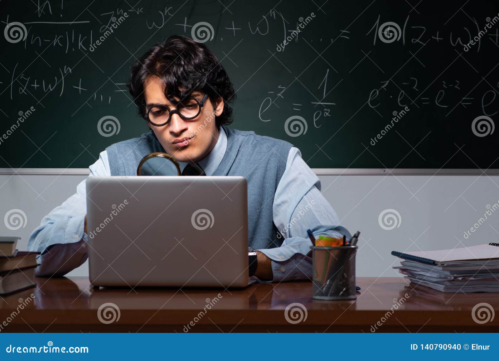 The Young Math Teacher in Front of Chalkboard Stock Photo - Image of ...