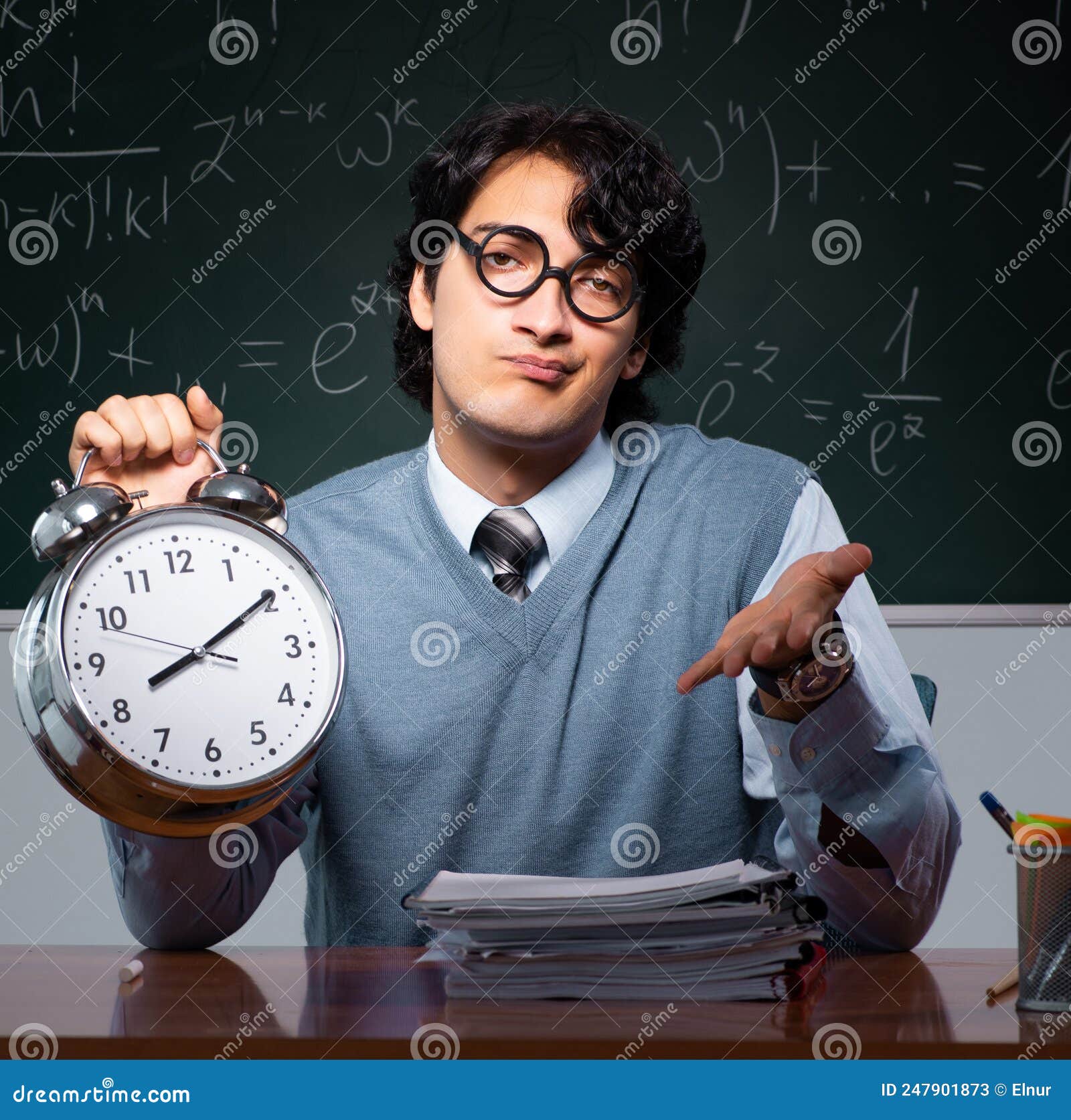 The Young Math Teacher in Front of Chalkboard Stock Image - Image of ...