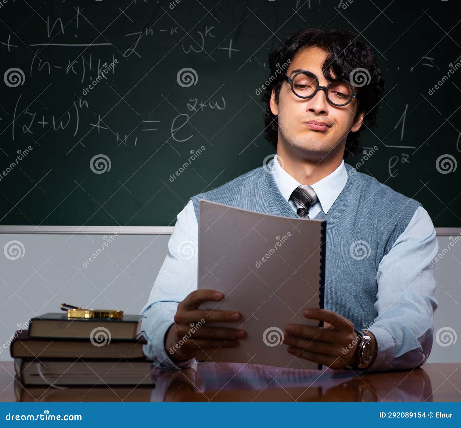Young Math Teacher in Front of Chalkboard Stock Photo - Image of ...