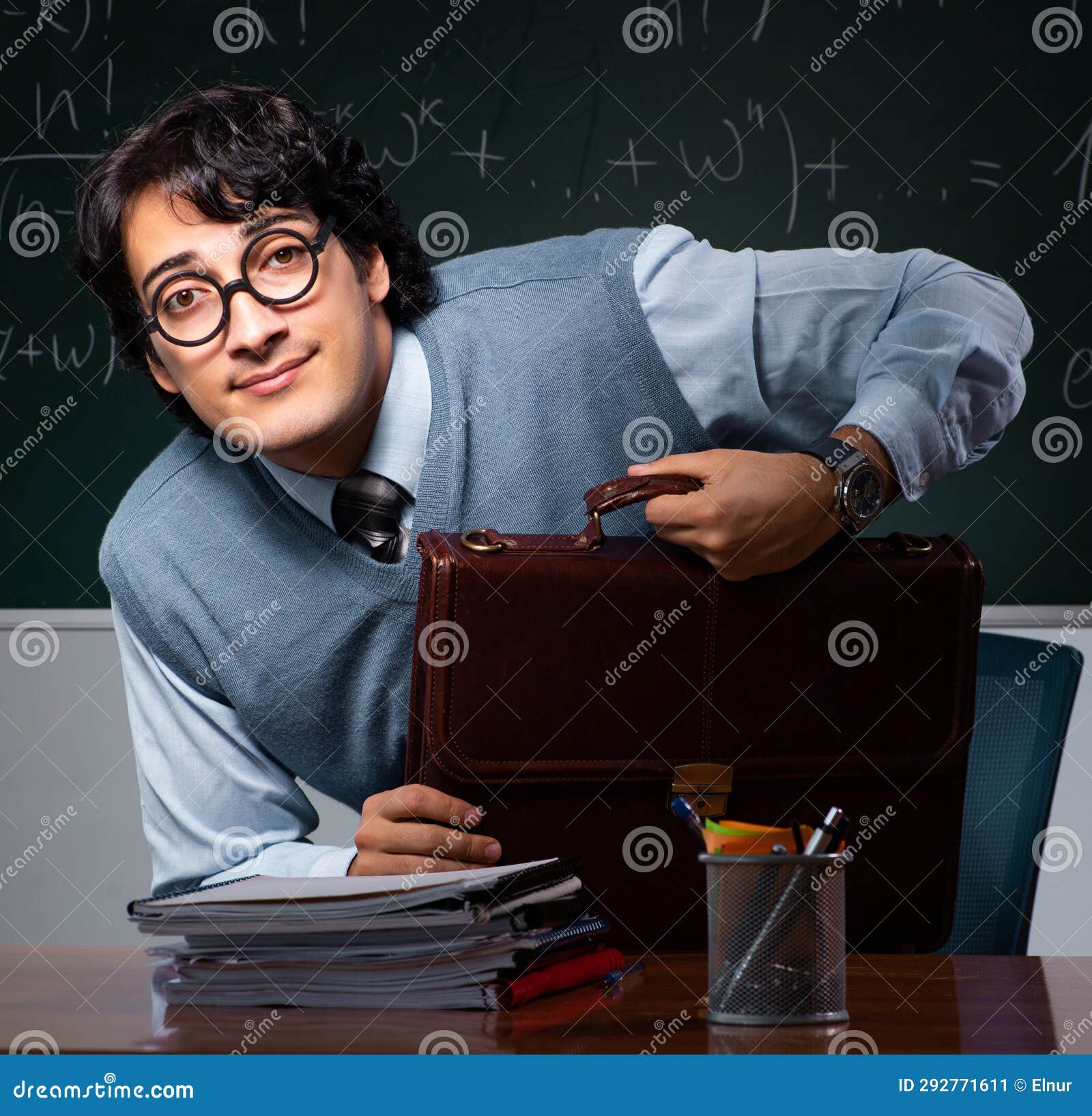 Young Math Teacher in Front of Chalkboard Stock Image - Image of ...